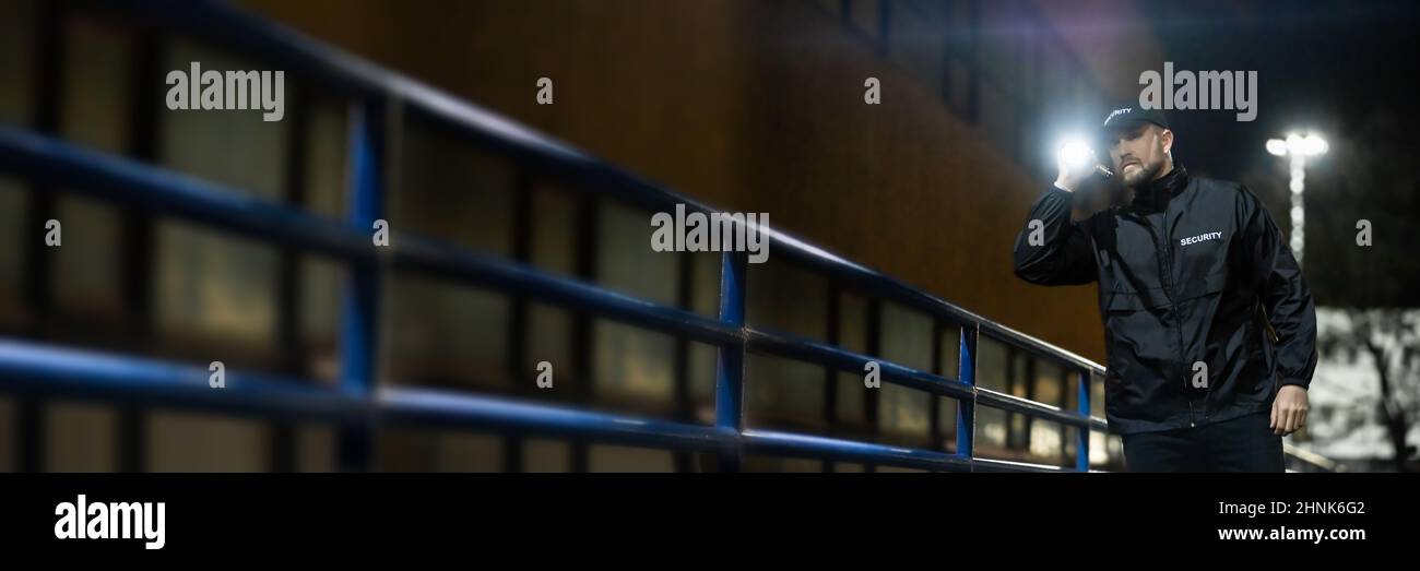 Security Guard Man At Night. Building Alley Patrol Stock Photo - Alamy