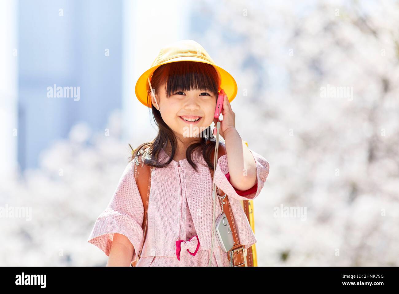 Japanese Elementary School Girl Operating A Cell Phone For Kids Stock ...