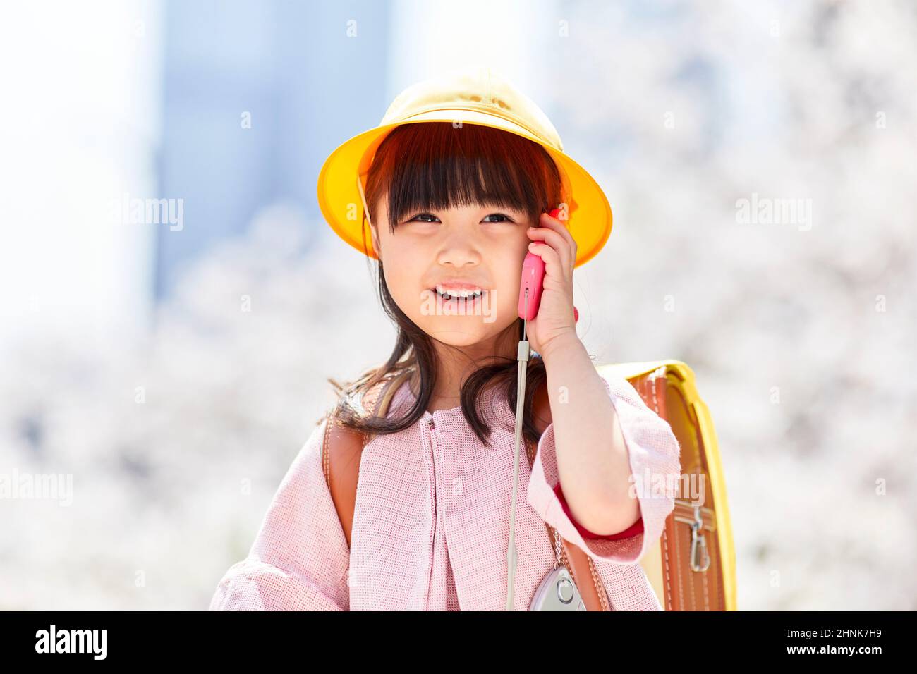 Japanese Elementary School Girl Operating A Cell Phone For Kids Stock ...