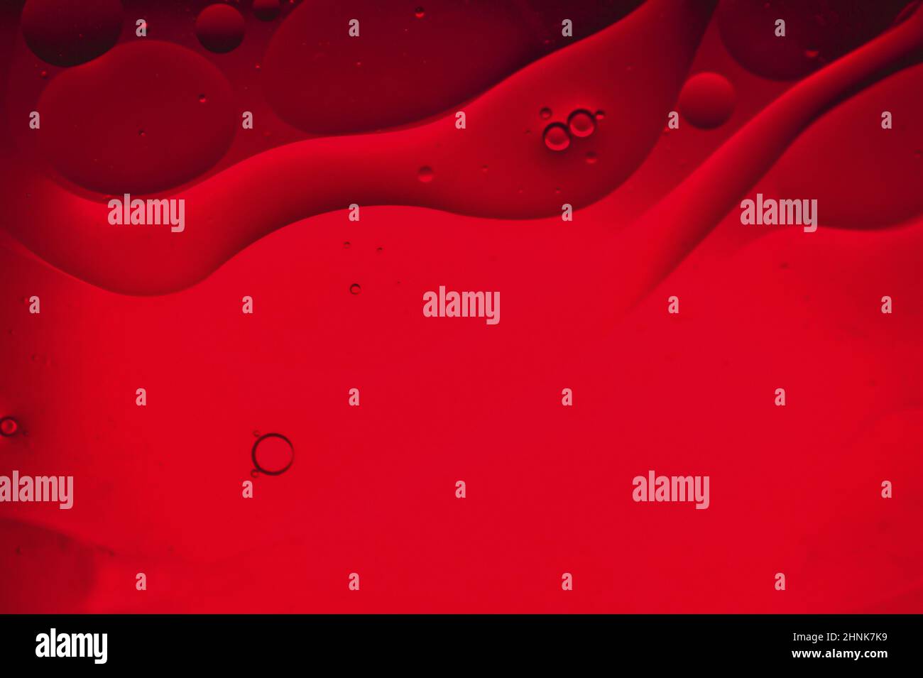 red color liquid and bubbles moving background Stock Photo - Alamy