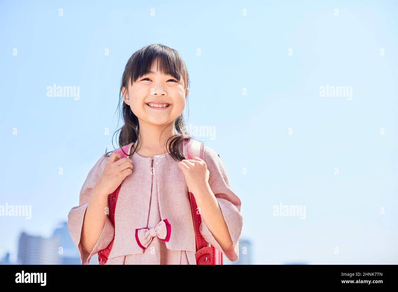 Japanese Elementary School Girl Looking Far Away Stock Photo - Alamy