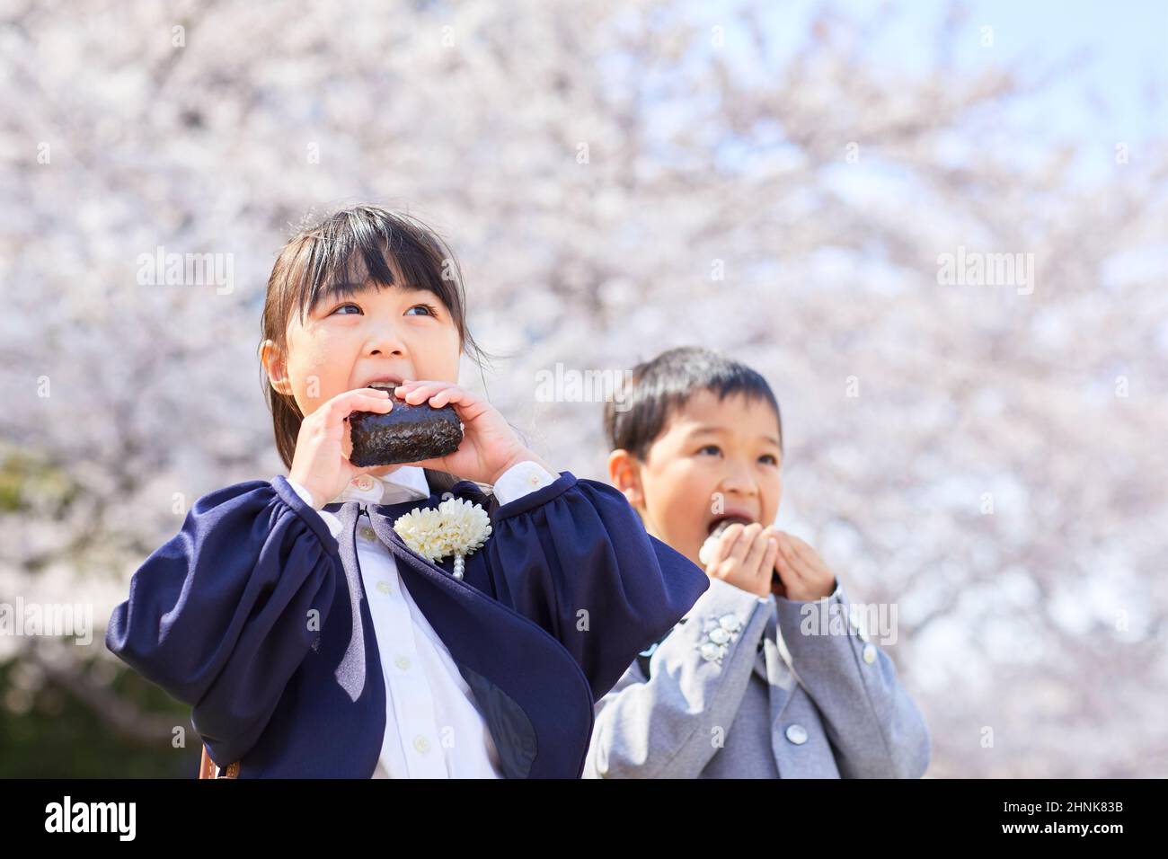 Girl eating rice ball hi-res stock photography and images - Alamy