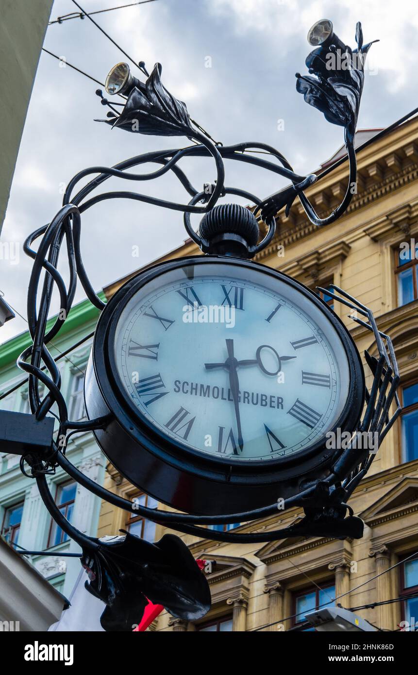 VIENNA, AUSTRIA - SEPTEMBER 1, 2013: Architectural detail, street clock ...