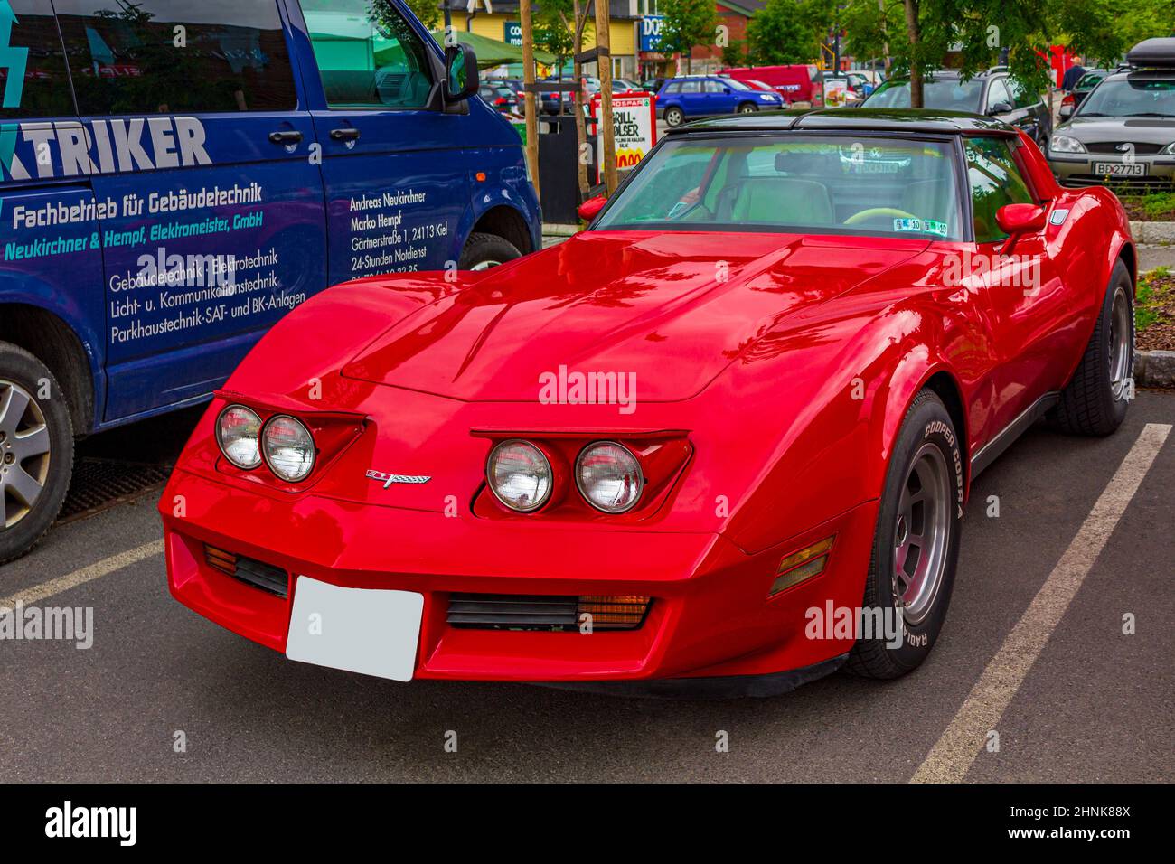 Bright red vintage sports car on parking lot Fagernes Norway Stock ...