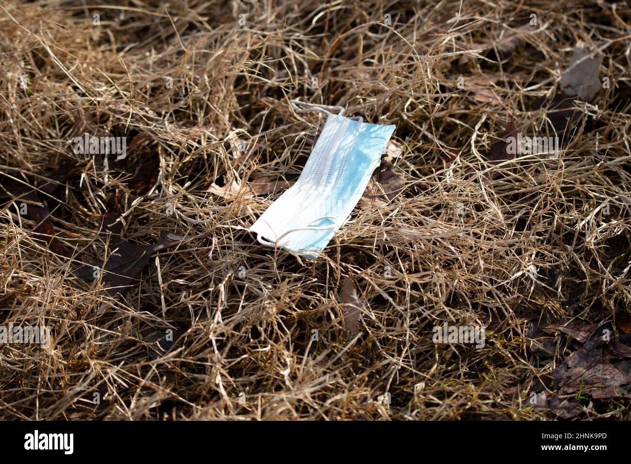 Mask Litter on the Ground Stock Photo - Alamy