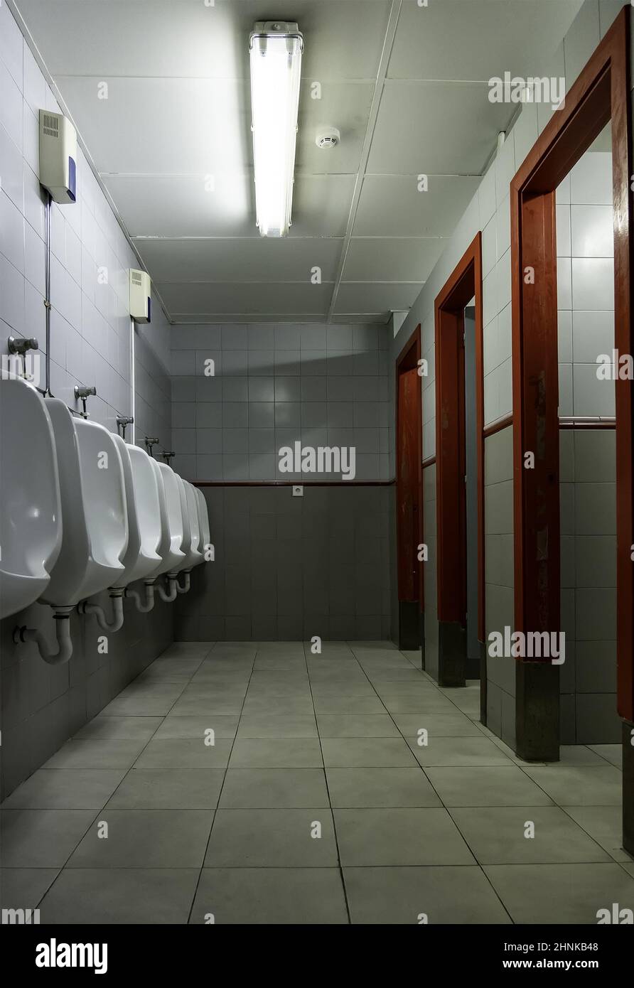 Men's restroom interior Stock Photo - Alamy