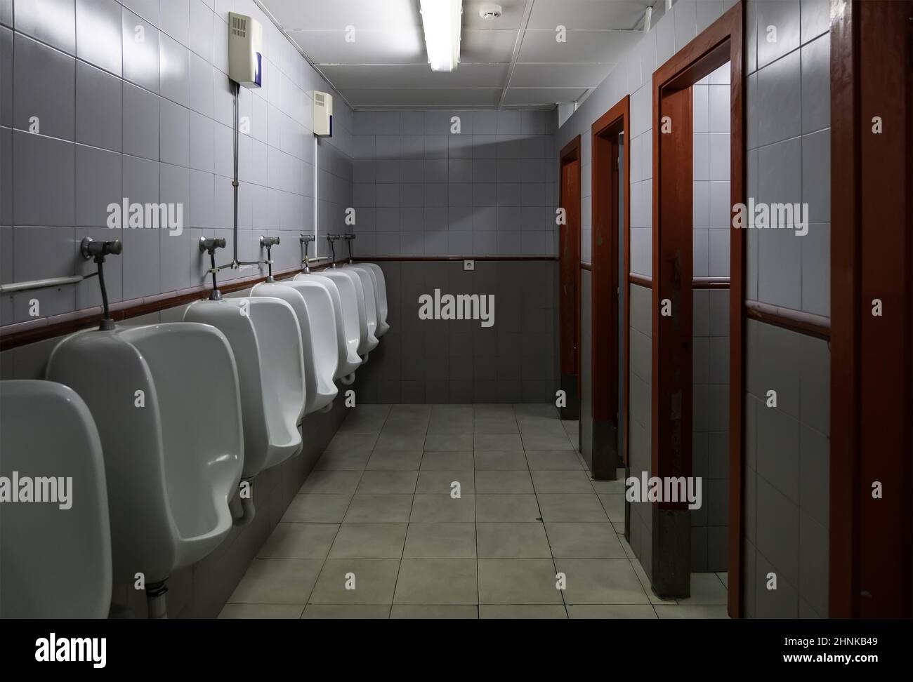 Men's restroom interior Stock Photo - Alamy