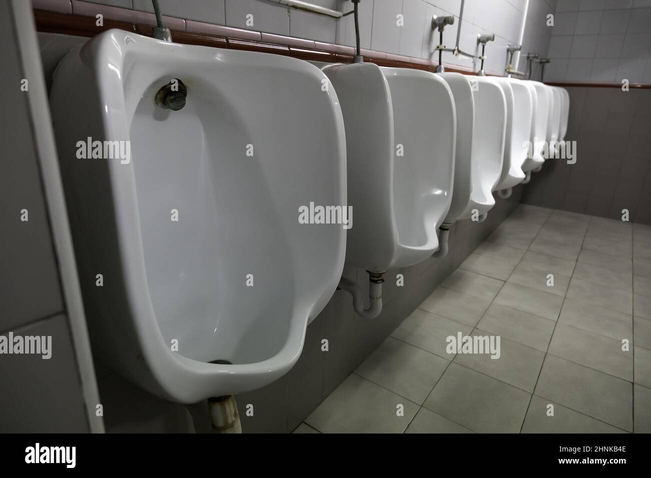 Men's restroom interior Stock Photo - Alamy