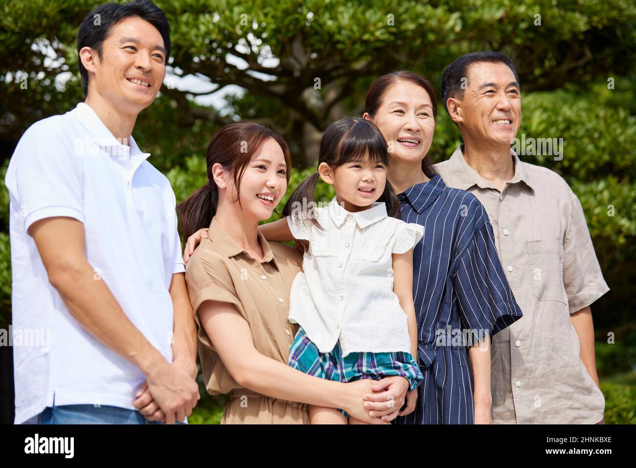Smiling Three-Generations Japanese Family Stock Photo - Alamy