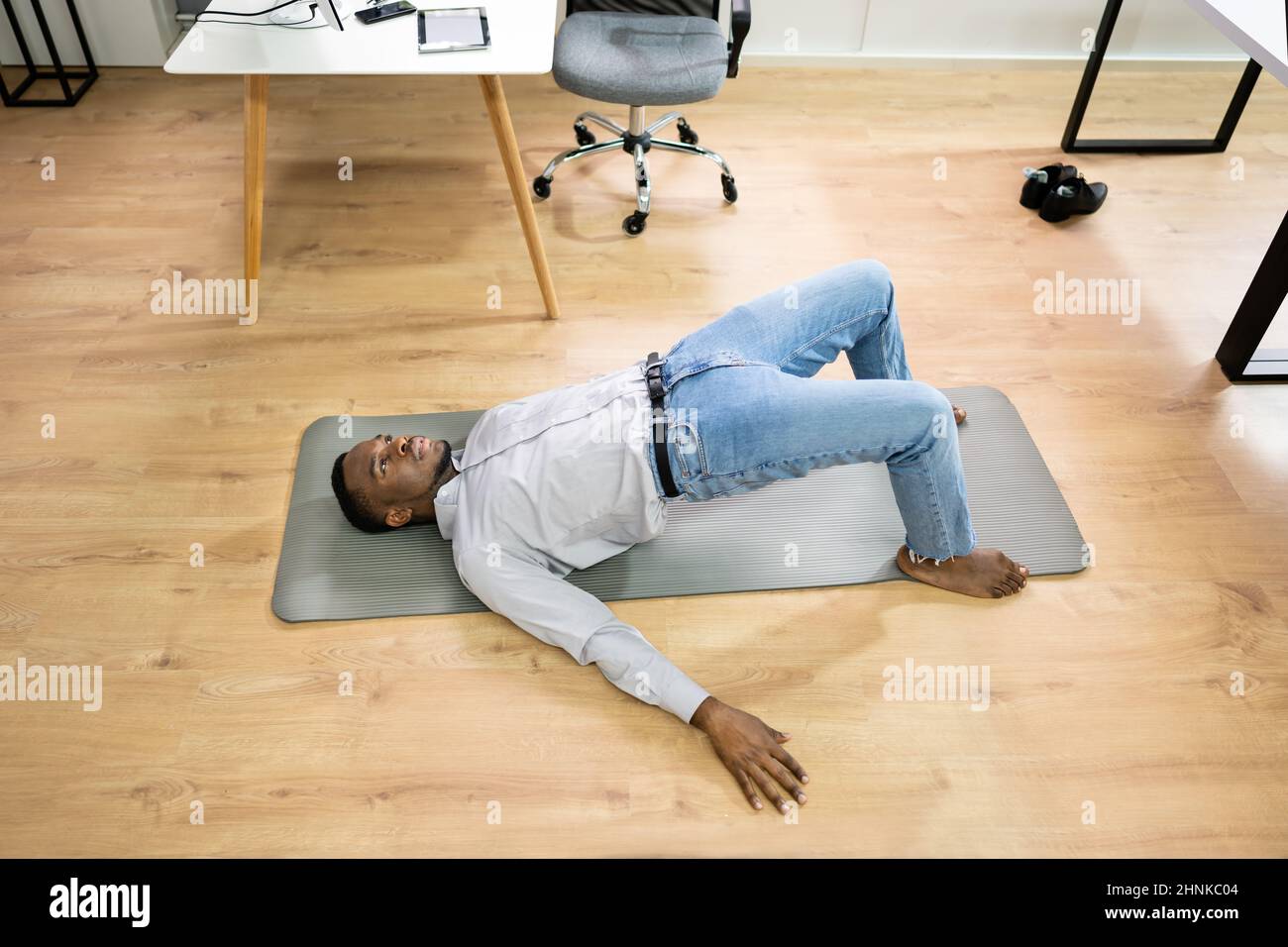African American Doing Office Exercise Workout Training Stock Photo - Alamy