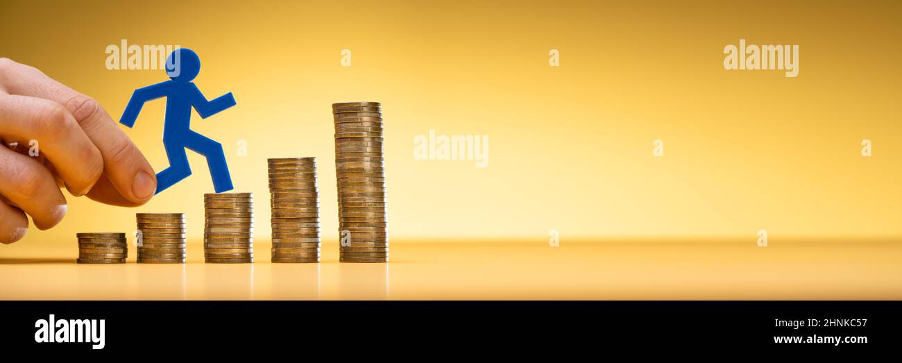 Money Investment And Growth Steps. Man Climbing Coins Stock Photo - Alamy