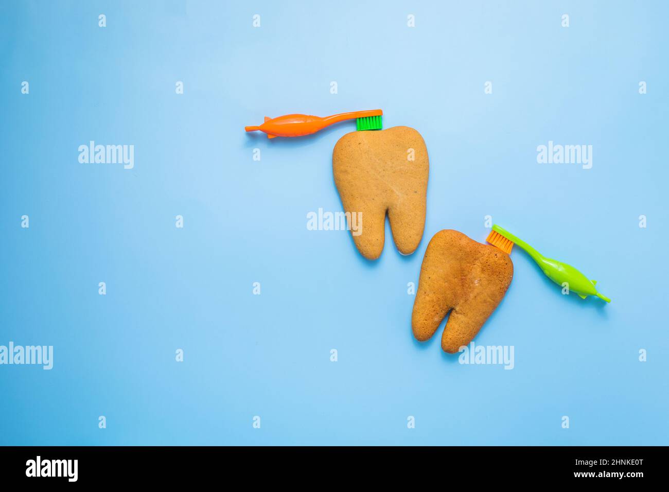 International Dentist Day. Tooth shaped cookies. Dental care concept ...