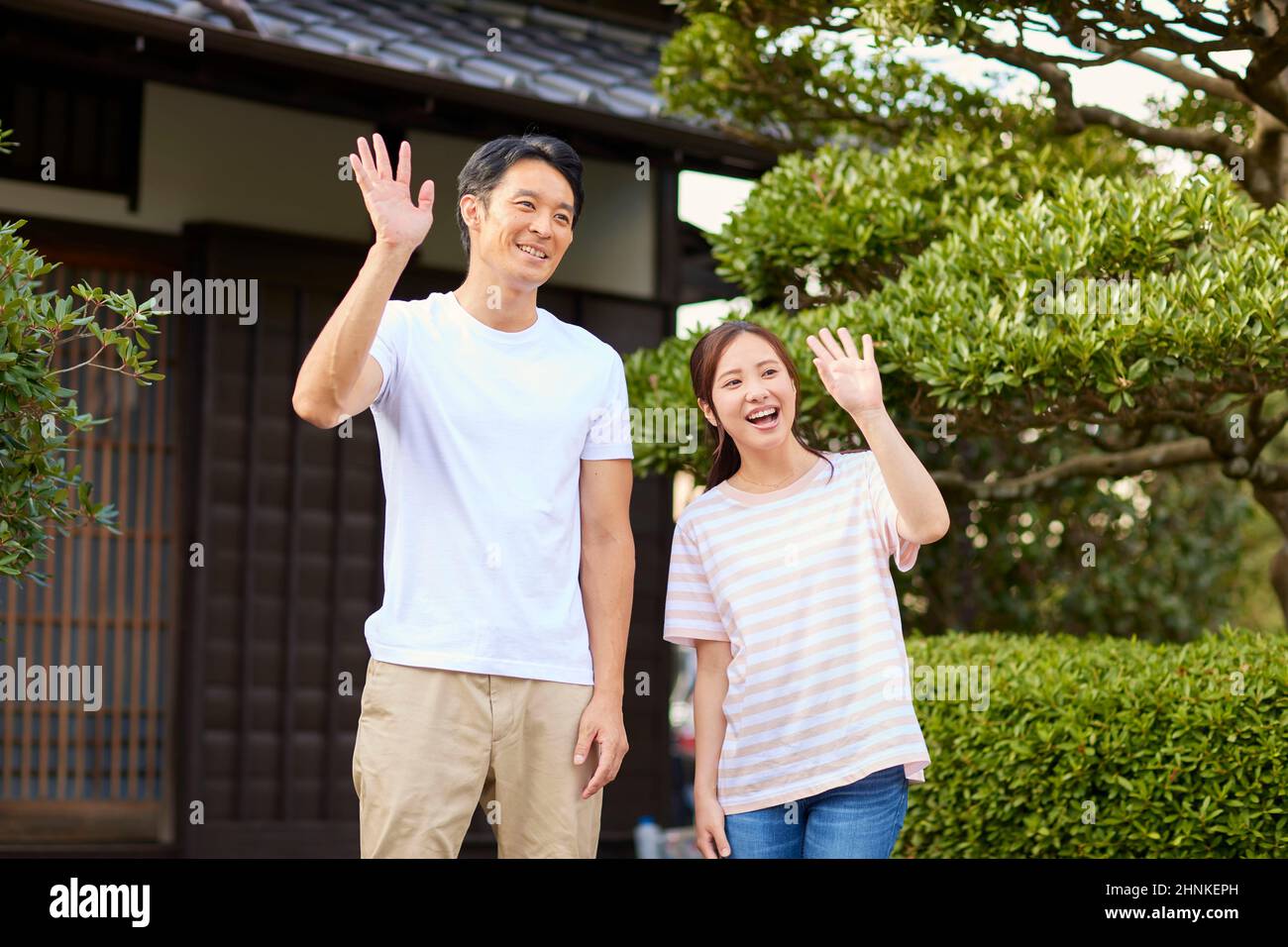 Japanese Couple Seeing Off Their Children Stock Photo - Alamy