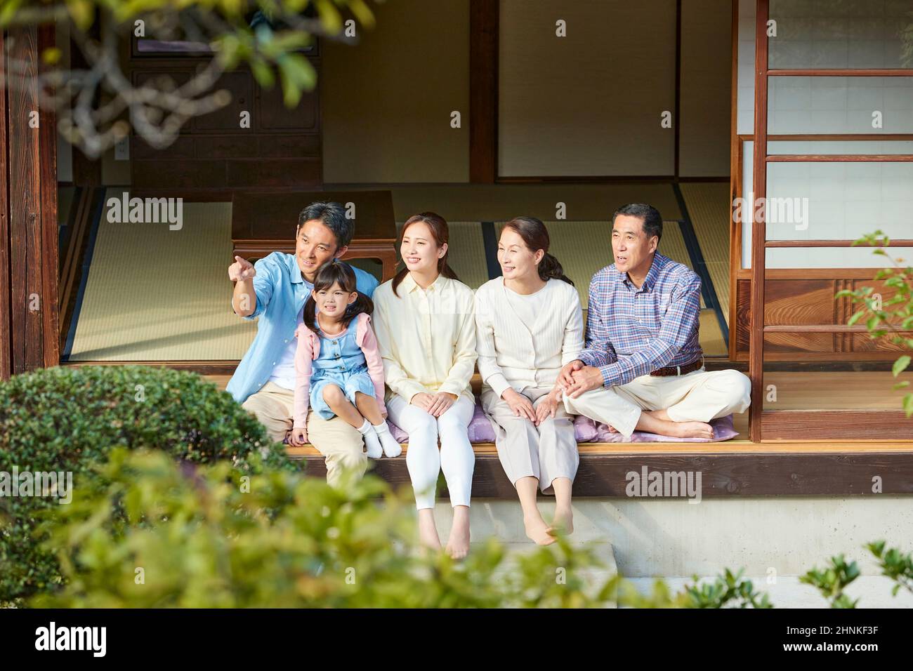 Three-Generations Japanese Family Sitting On The Porch Stock Photo - Alamy