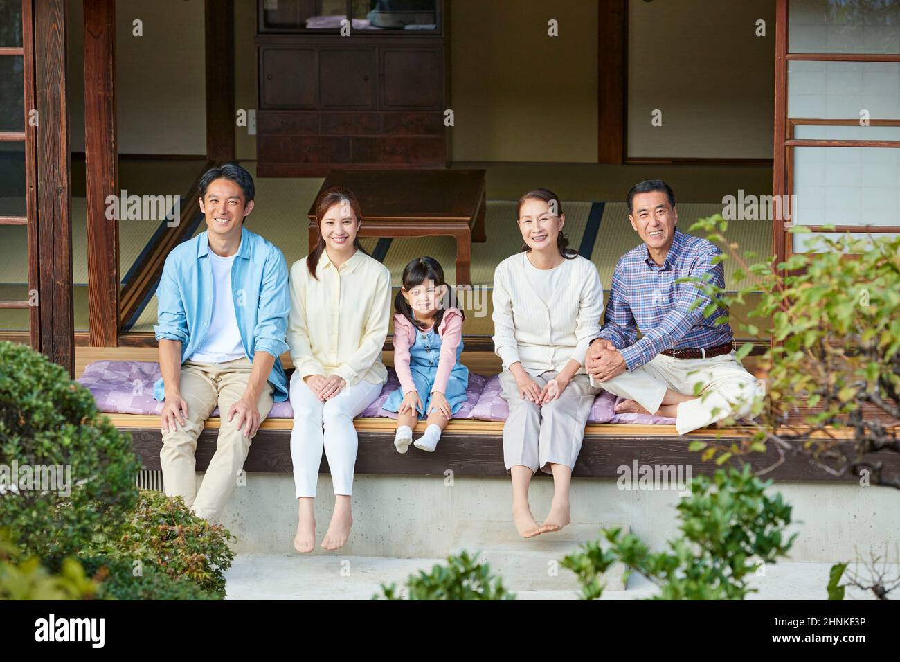Three-Generation Japanese Family Sitting On The Porch Stock Photo - Alamy