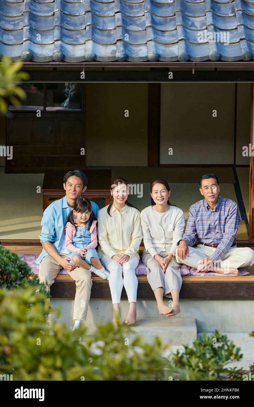 Three-Generations Japanese Family Sitting On The Porch Stock Photo - Alamy