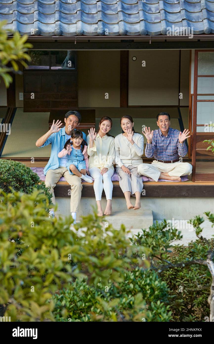 Three-Generations Japanese Family Sitting On The Porch Stock Photo - Alamy