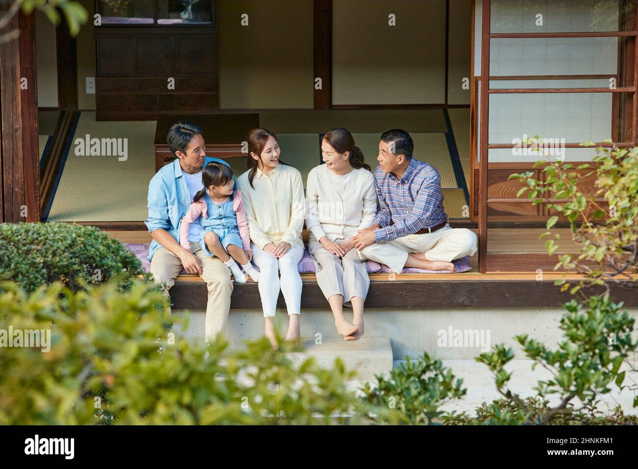 Three-Generations Japanese Family Sitting On The Porch Stock Photo - Alamy