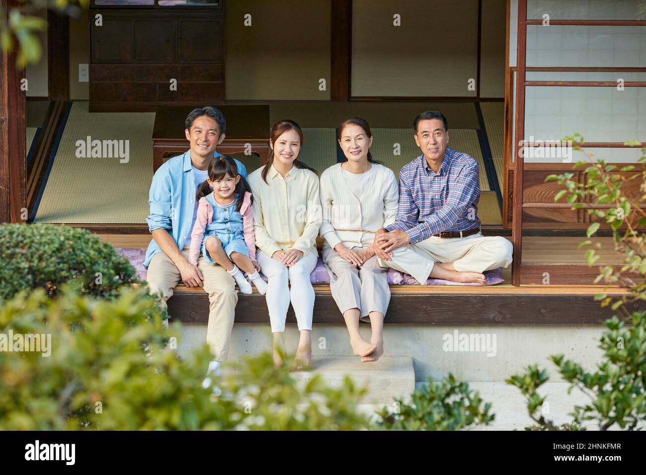 Three-Generations Japanese Family Sitting On The Porch Stock Photo - Alamy