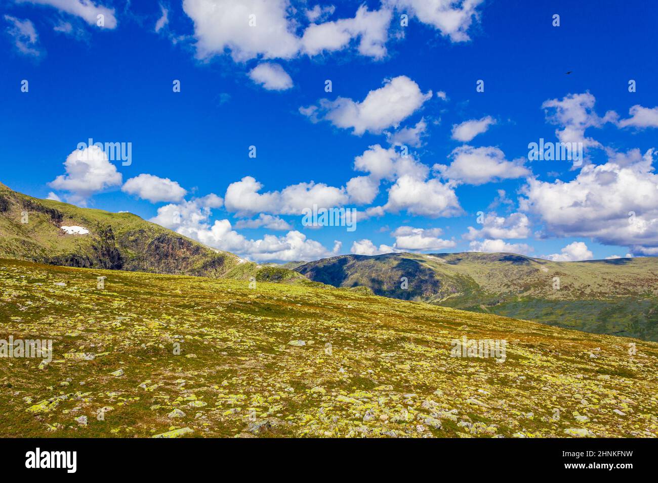 Amazing norwegian landscape with Boulders at the summit on the mountain ...