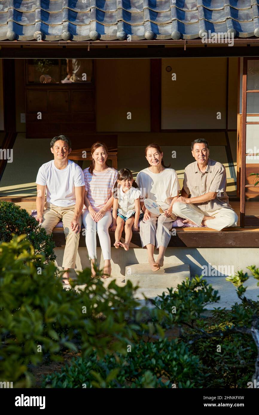 Three-Generations Japanese Family Sitting On The Porch Stock Photo - Alamy