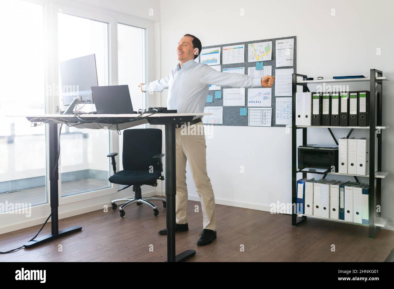 Man exercises in office hi-res stock photography and images - Alamy