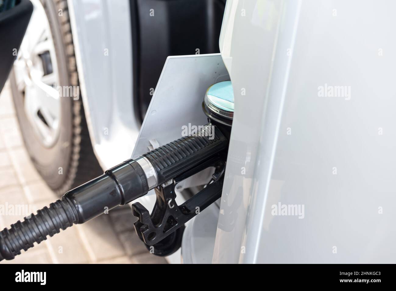 White clean car refueling on a petrol station Stock Photo - Alamy