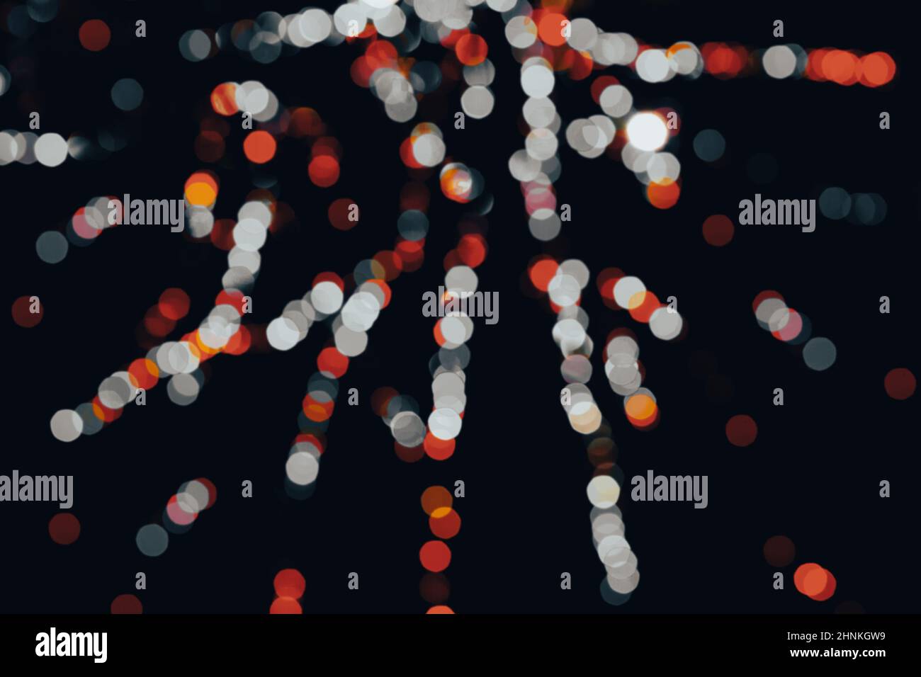 Beautiful colorful bokeh fireworks in the night sky Stock Photo - Alamy