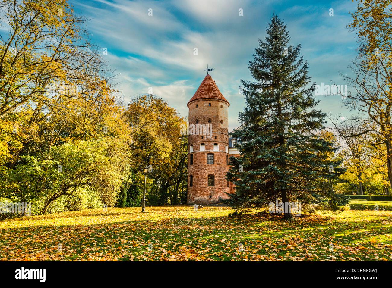 autumn golden foliage of renaissance raudondvaris manor castle Stock ...