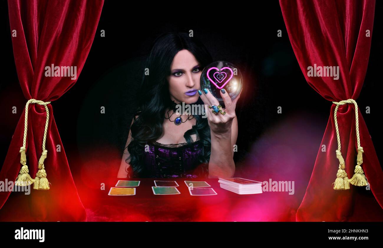 Psychic with Crystal Ball and tarot cards With Red Velvet Curtains ...