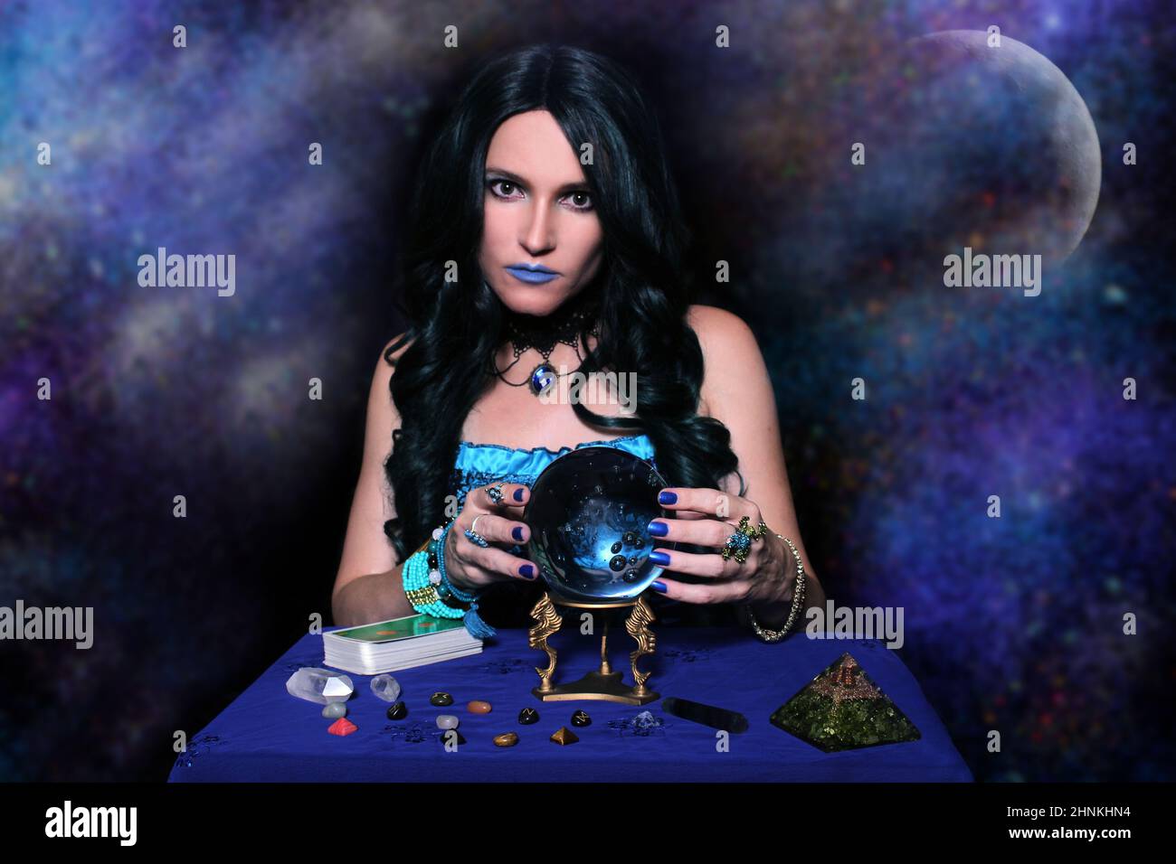 Psychic with Crystal Ball. and tarot cards on Galaxy Background Stock ...