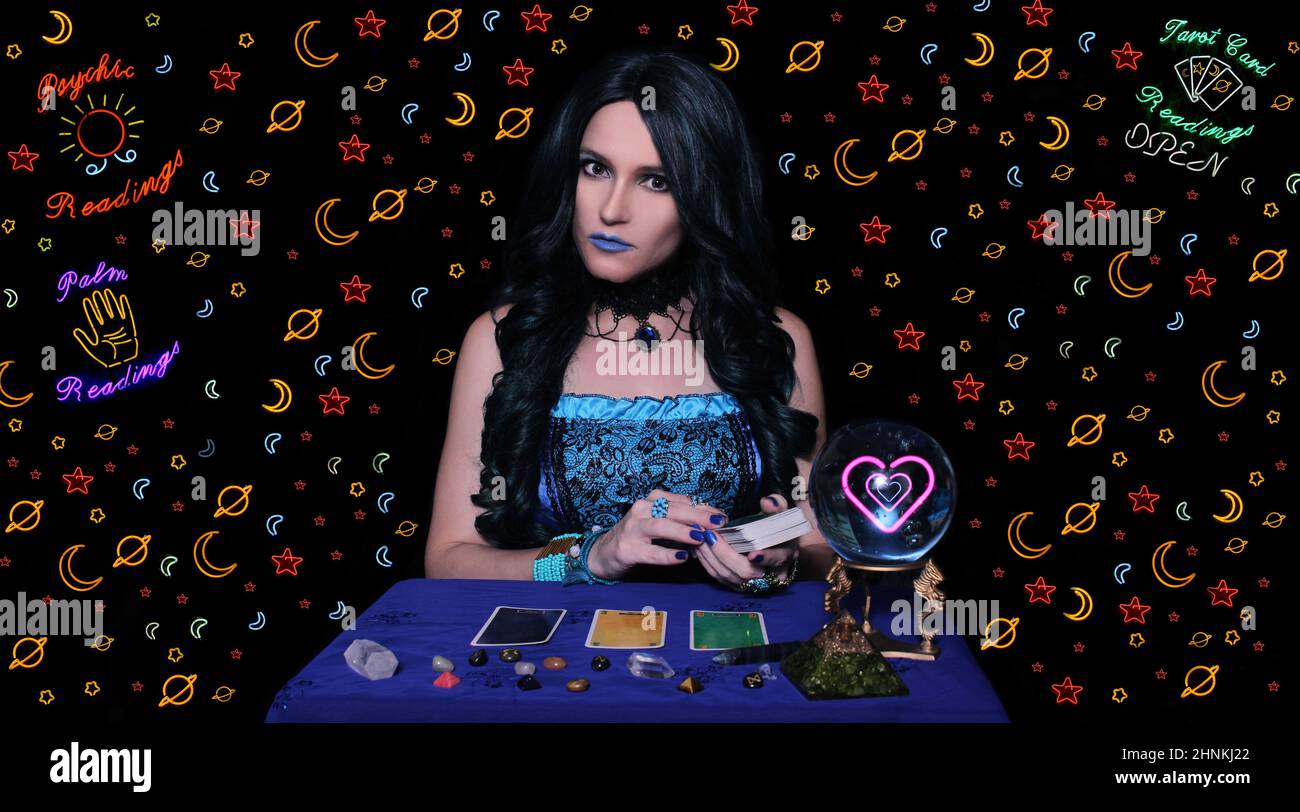 Psychic Tarot Card Reader With Vintage Neon Signs Stock Photo - Alamy