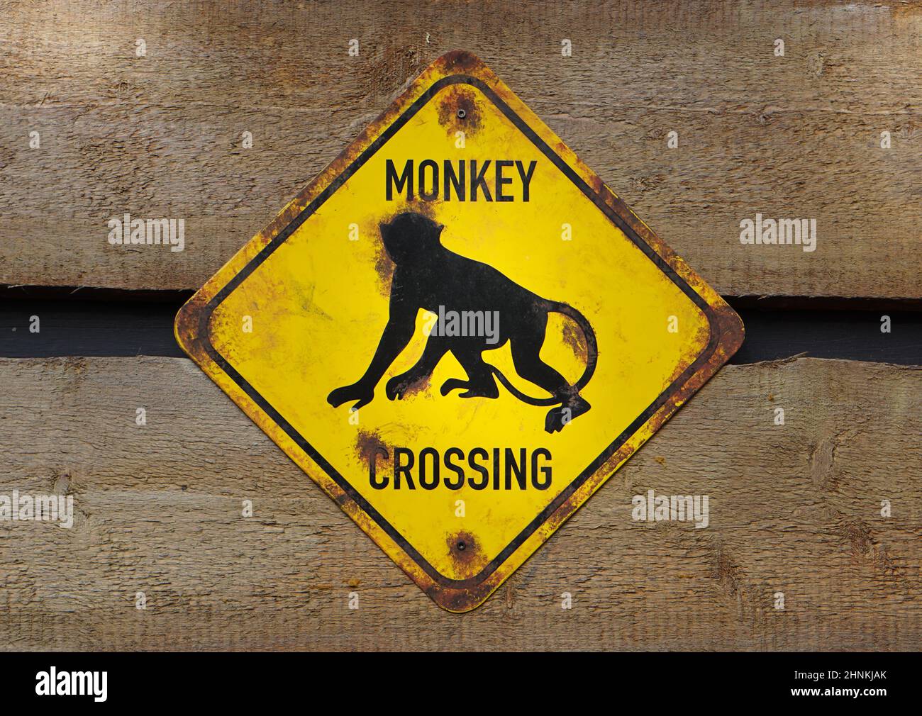 Sign "Monkey crossing Stock Photo - Alamy