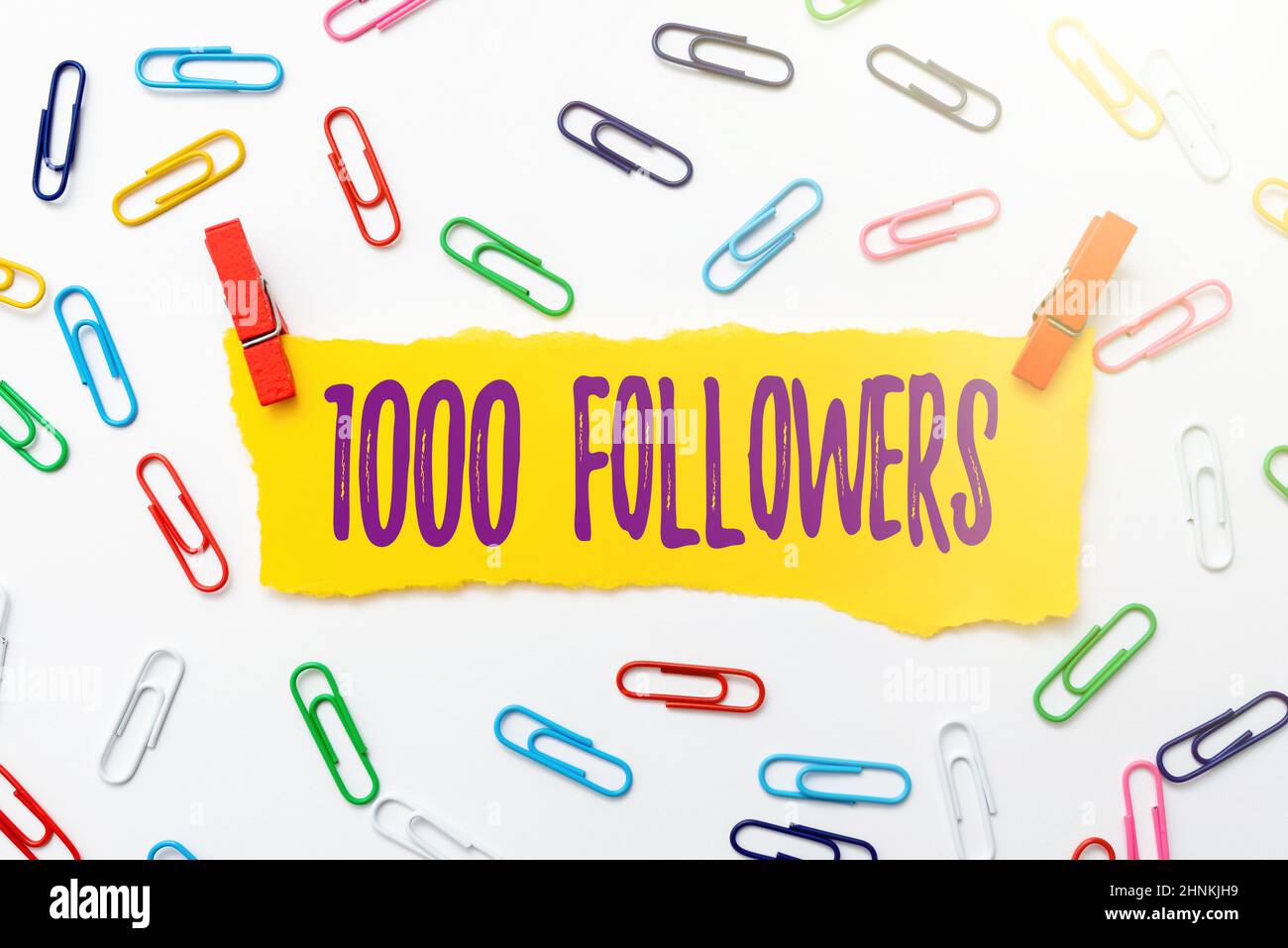 Sign displaying 1000 Followers, Word Written on number of individuals ...
