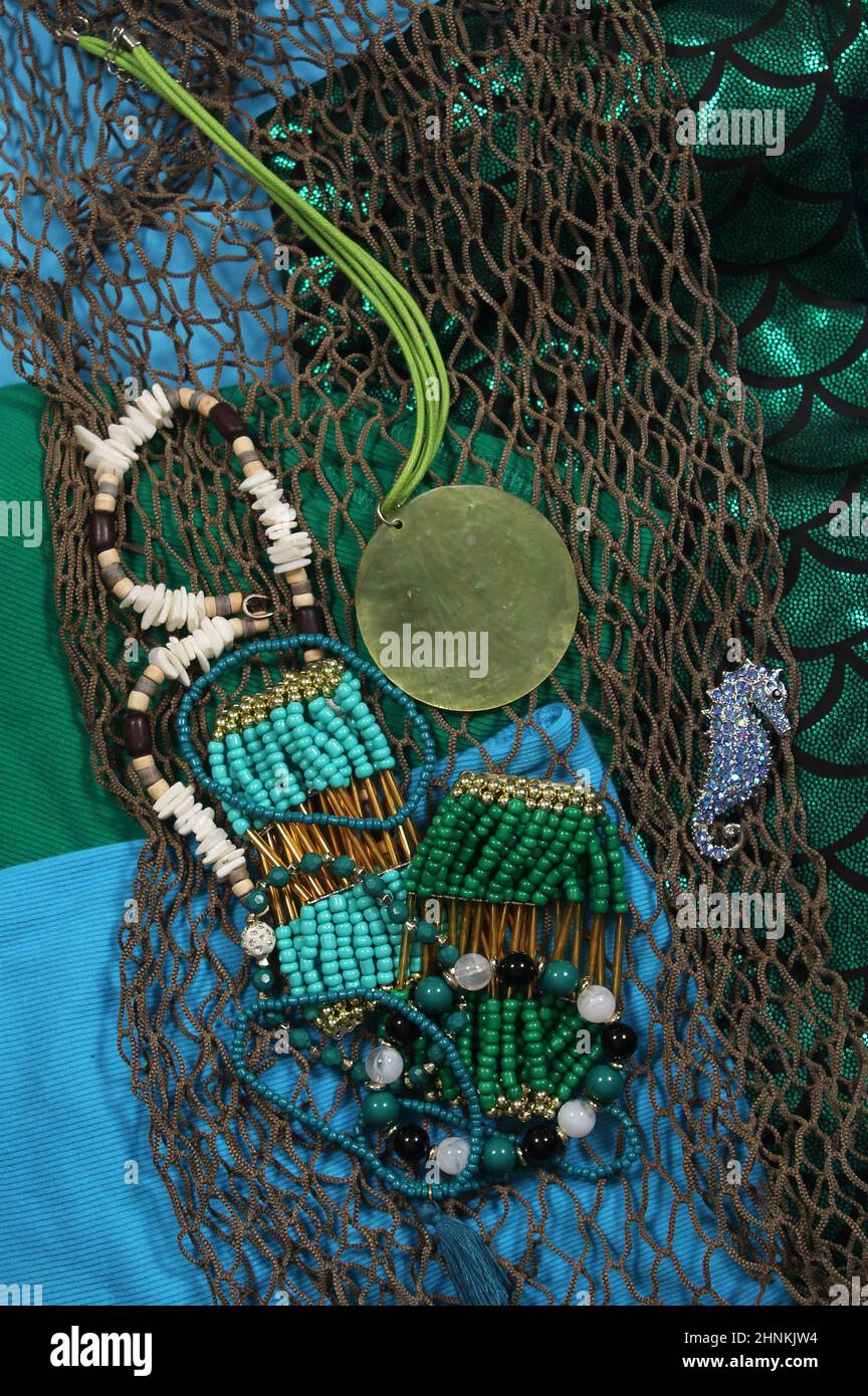 Mermaid Fashion With Jewelry and Fishing Net Stock Photo - Alamy