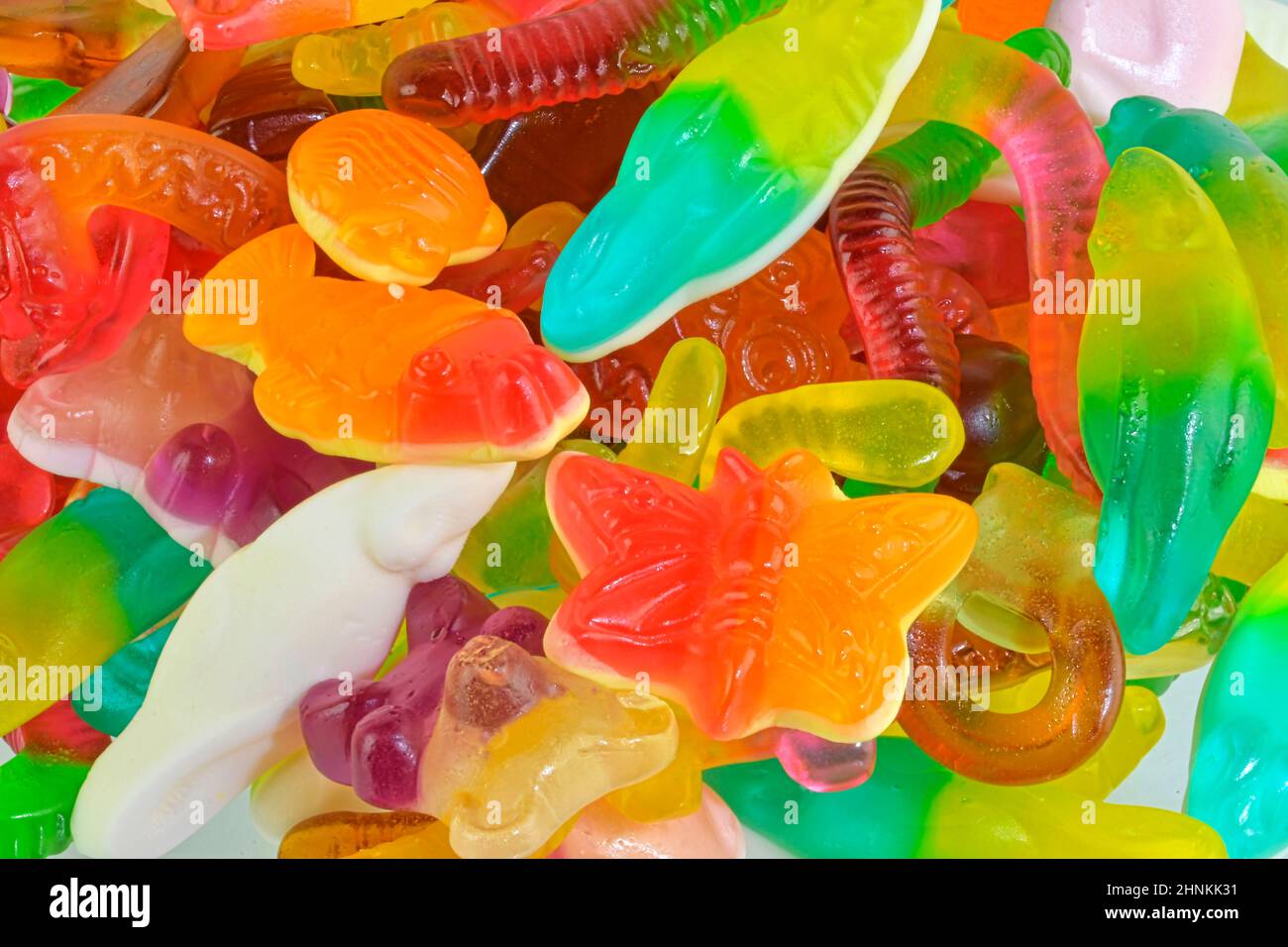 Assorted tasty gummy candies. Top view. Fruit gummy candies background ...