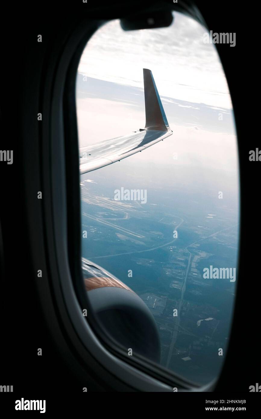 View from an airplane window outside at the wing Stock Photo - Alamy