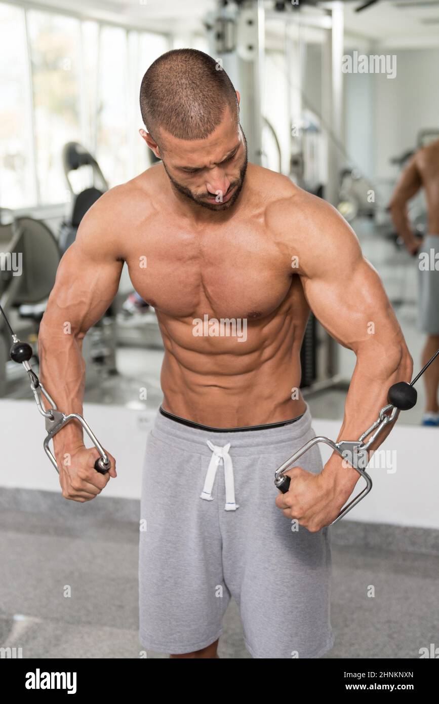 Muscular Man Exercising Chest Stock Photo - Alamy
