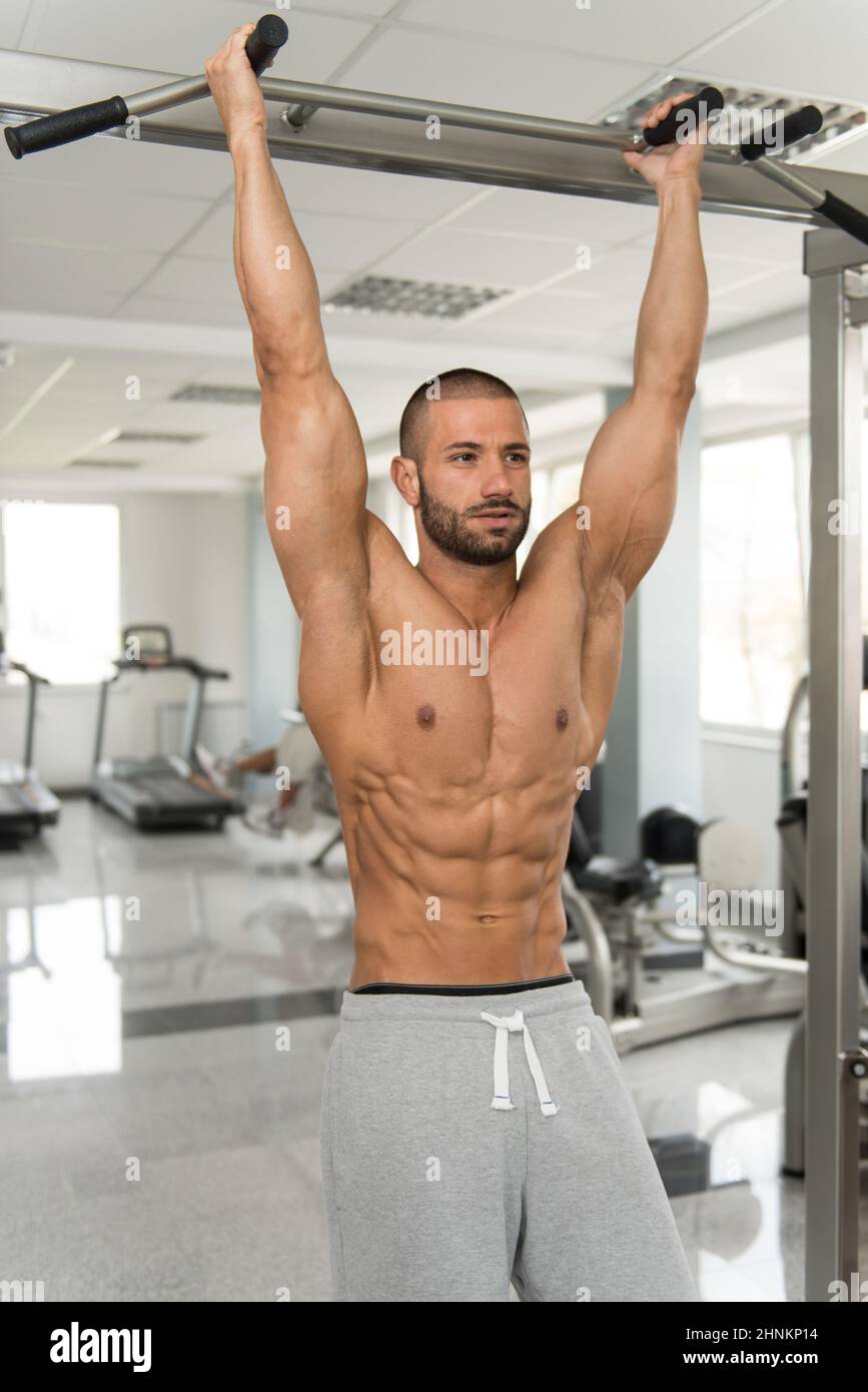 Man Performing Hanging Leg Raises Exercise Ab Exercises Stock Photo - Alamy