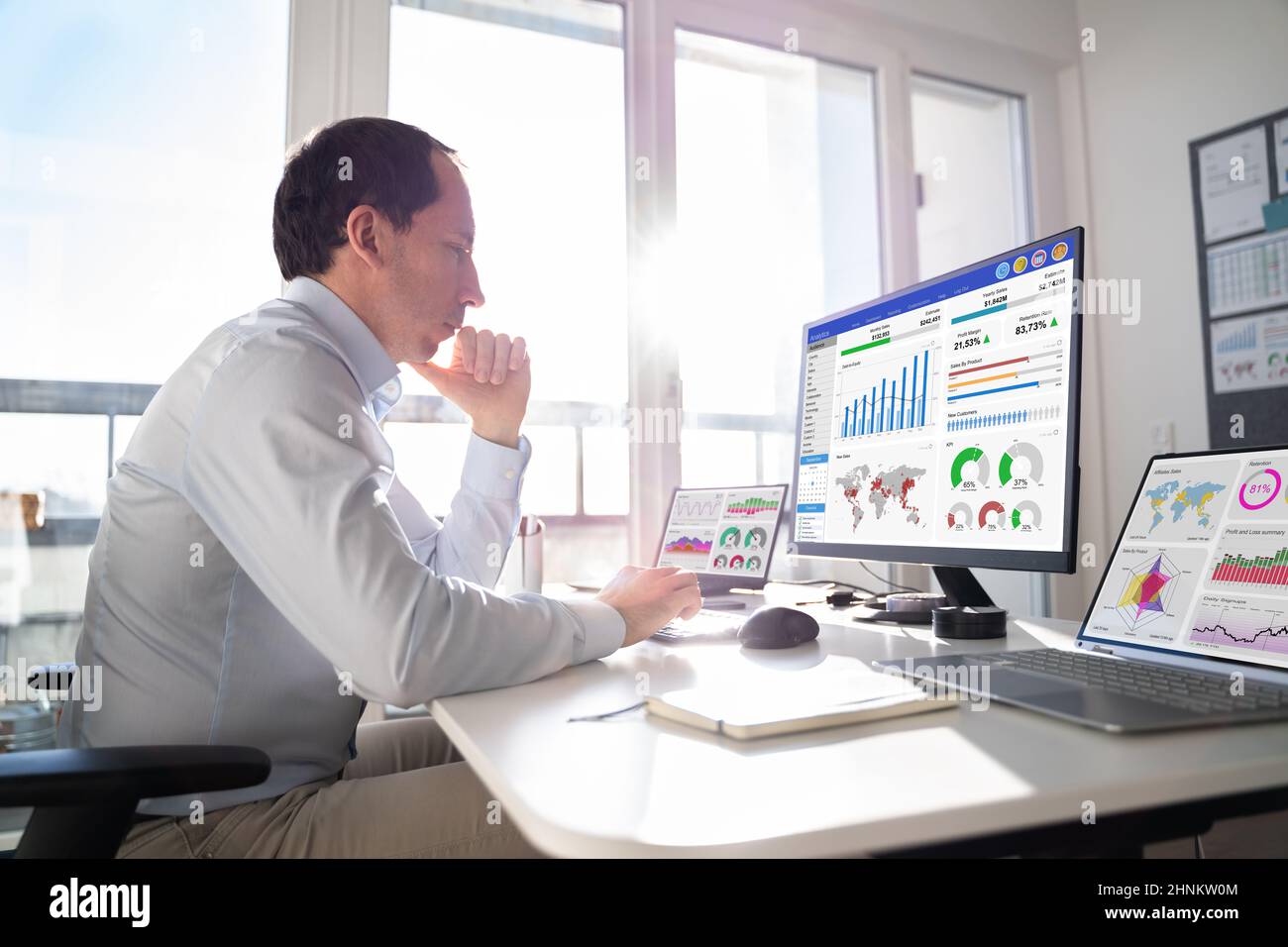 Business man laptop data hi-res stock photography and images - Alamy