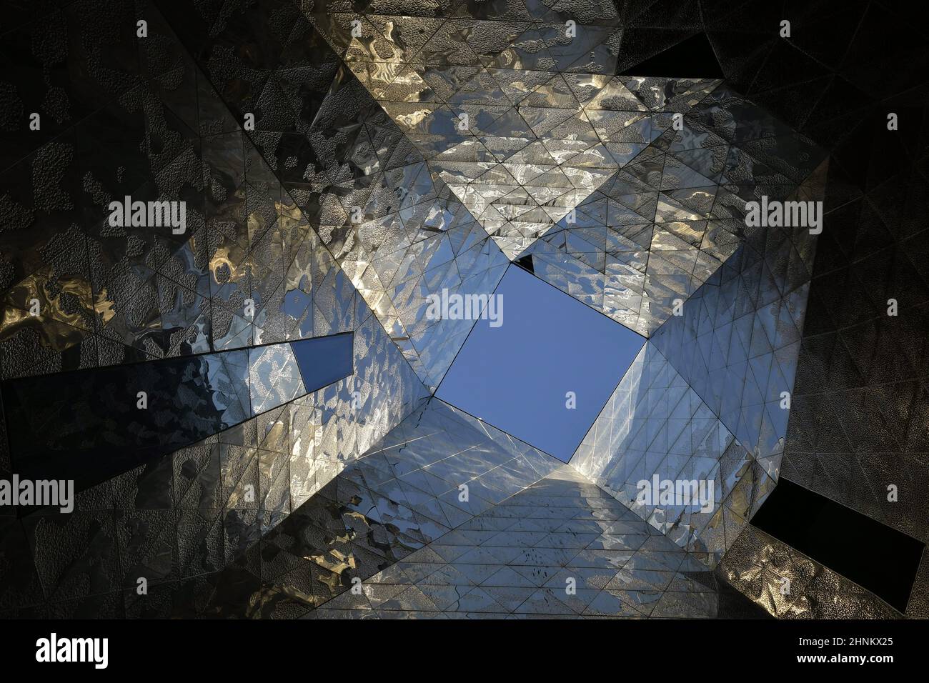 Museu Blau - modern canopy structure with reflective metal cladding ...