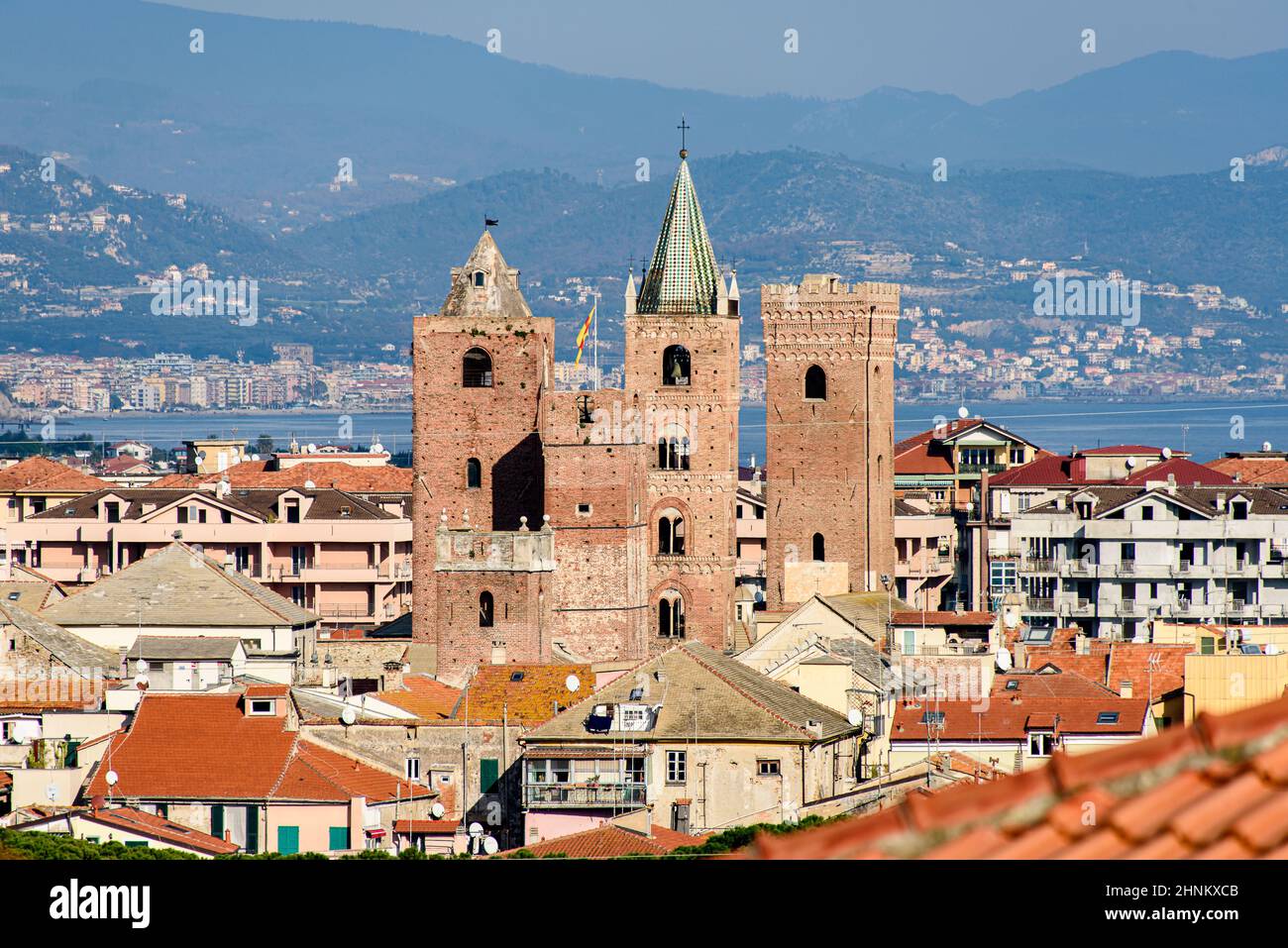 The medieval towers in the cityscape of the ligurian village of Albenga ...