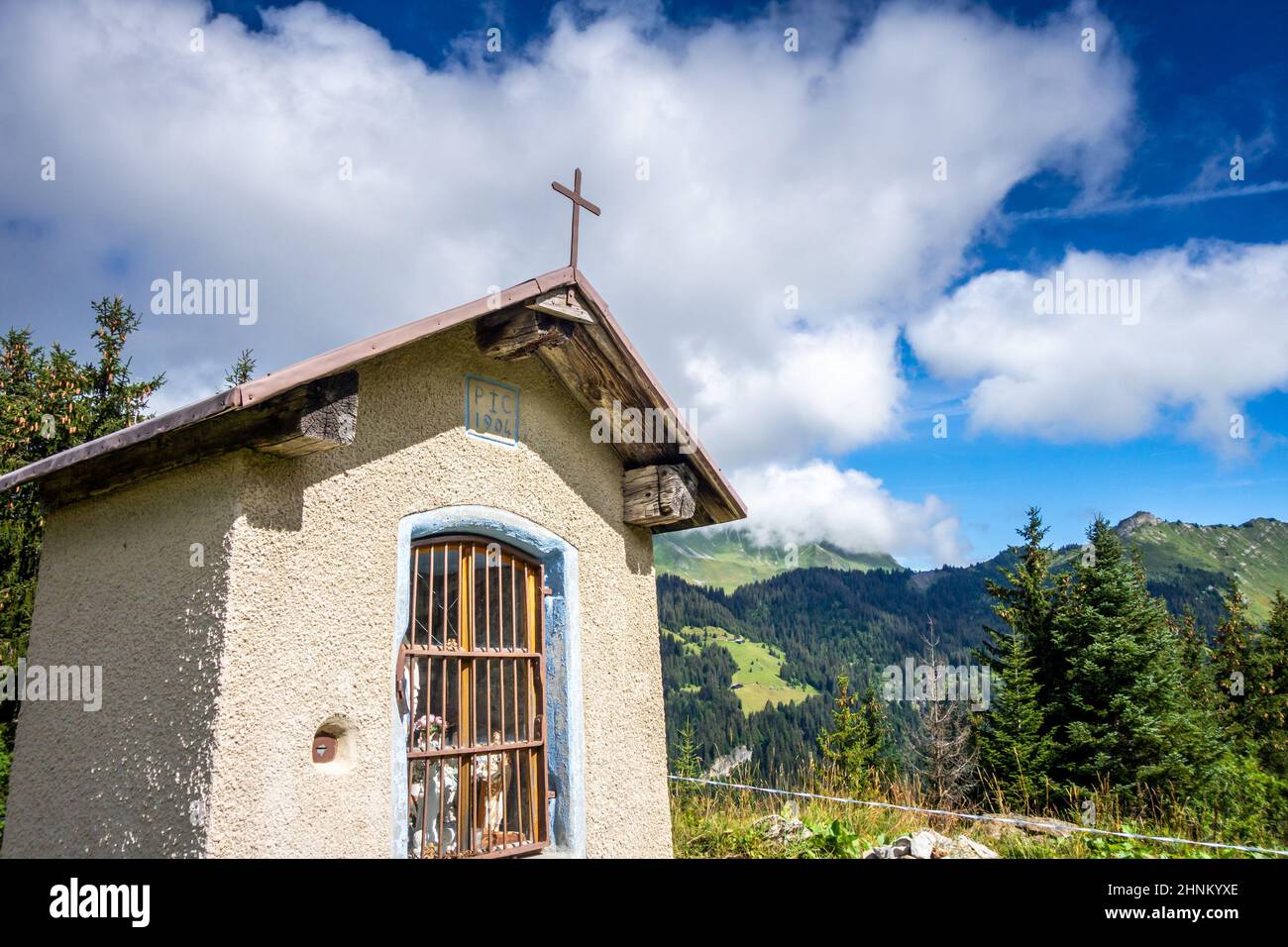Small chapel in front of a mountain landscape Stock Photo - Alamy