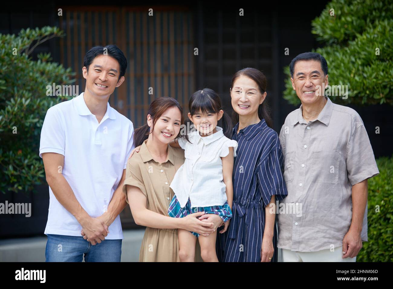 Smiling Japanese Family Of Three Generations Stock Photo - Alamy