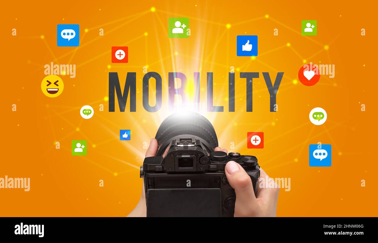 Using camera to capture social media content Stock Photo - Alamy