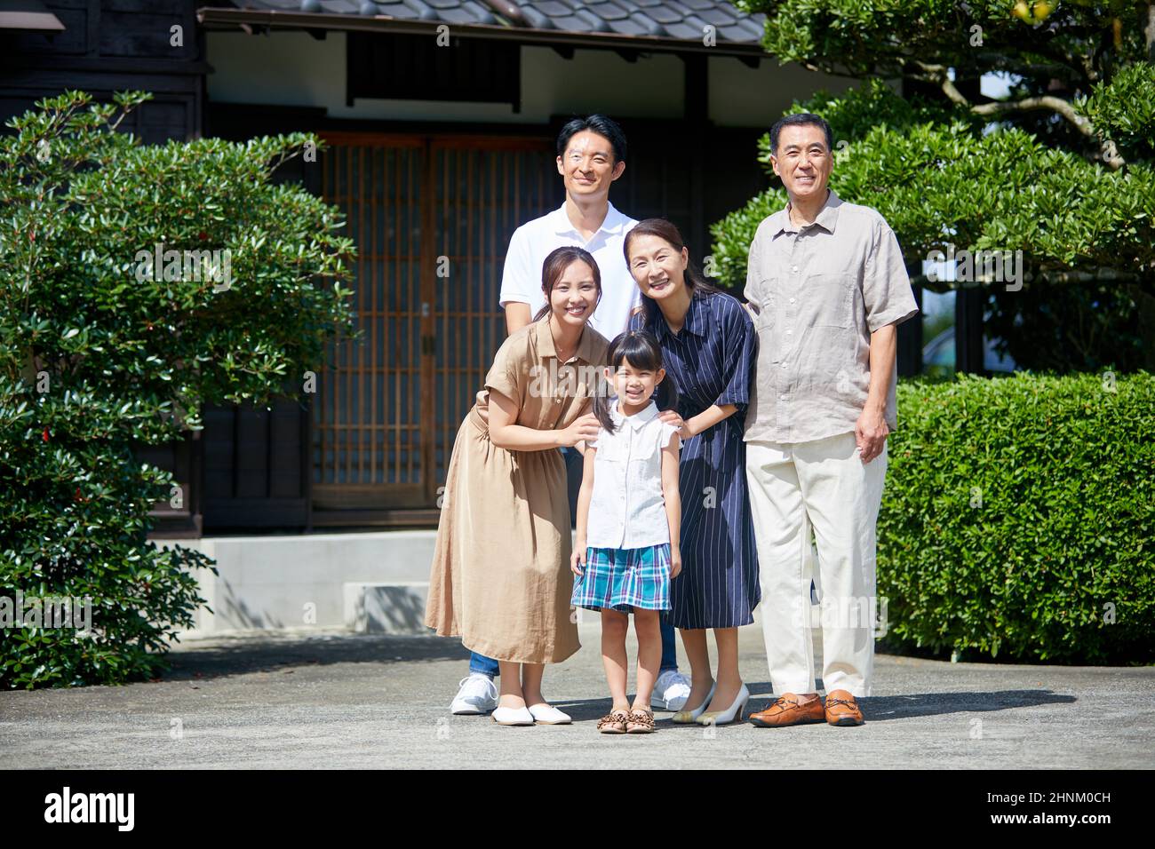Smiling Three-Generations Japanese Family Stock Photo - Alamy