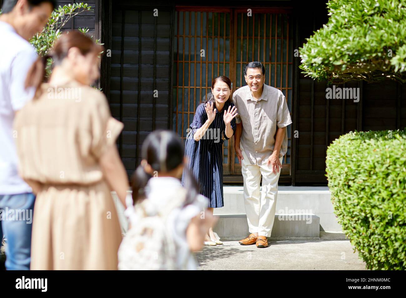 Smiling Three-Generations Japanese Family Stock Photo - Alamy