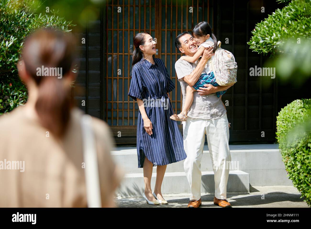 Smiling Three-Generations Japanese Family Stock Photo - Alamy