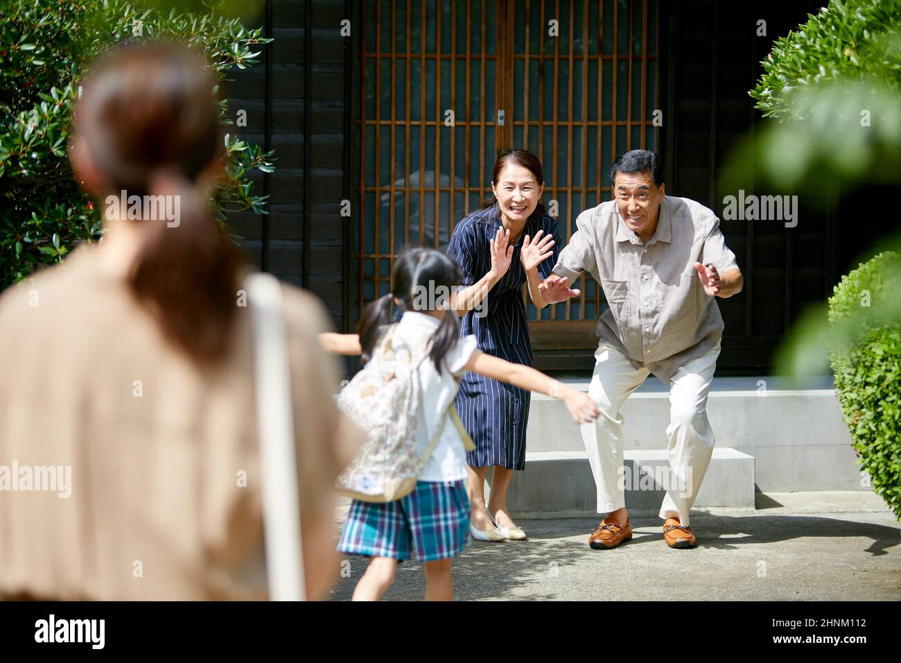 Smiling Three-Generations Japanese Family Stock Photo - Alamy
