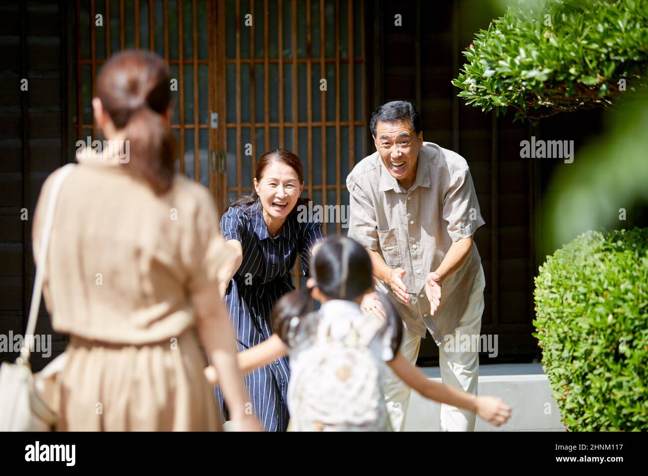Smiling Three-Generations Japanese Family Stock Photo - Alamy
